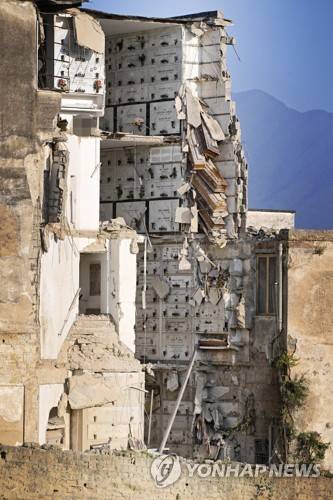 ITALY CURIOSITIES NAPLES CEMETERY COLLAPSE