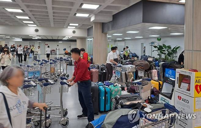 수하물 대란 김포공항 오늘은 정상 운행어제 142편 지연